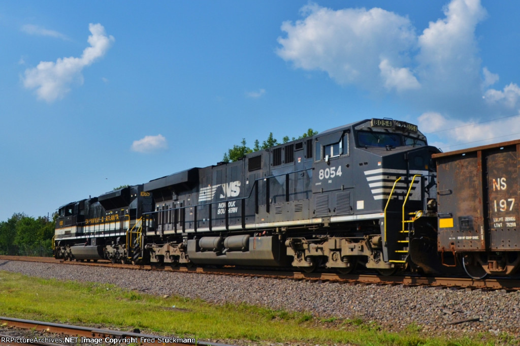NS 1065 & 8054 lead 15K west on 2 track.